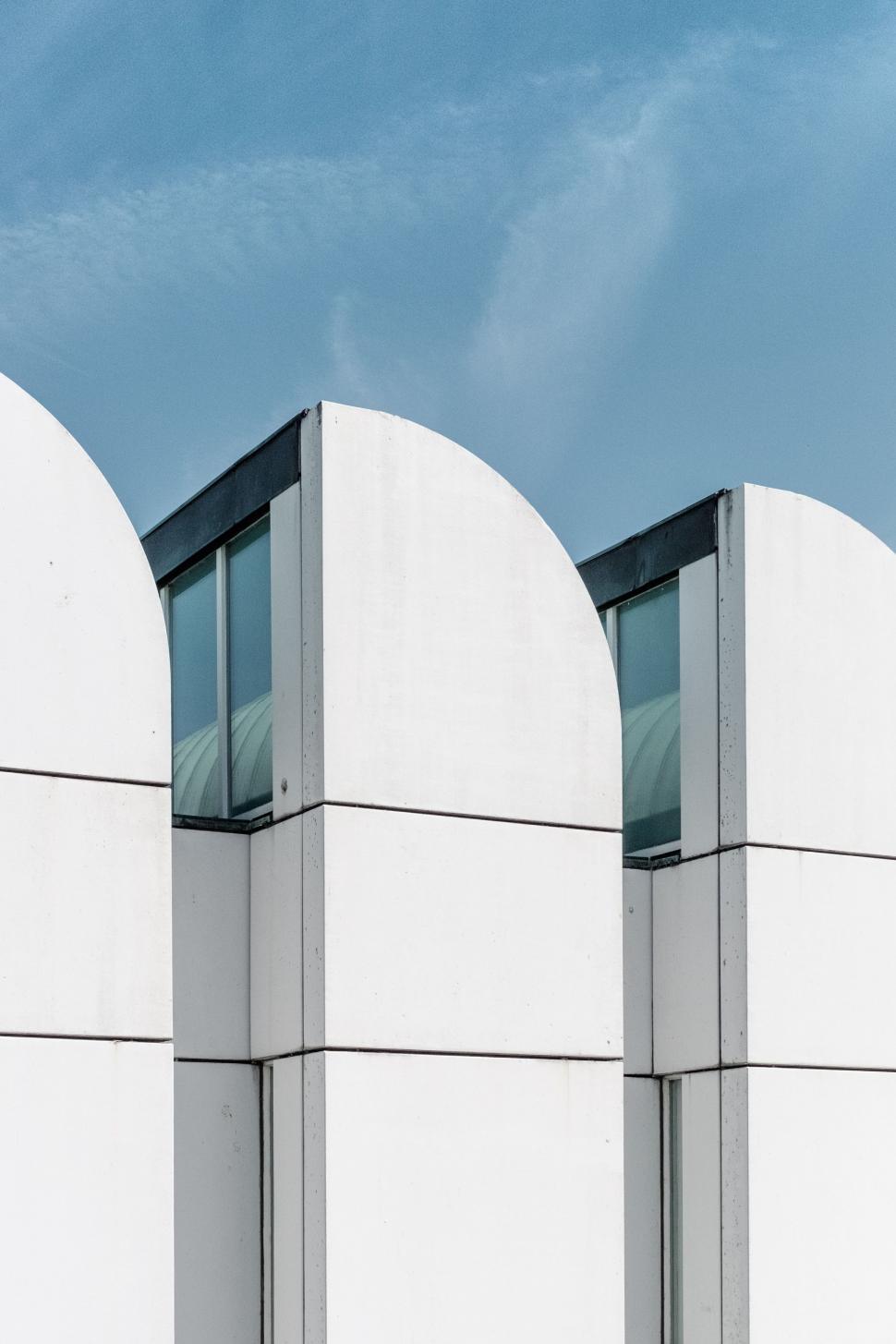 Free Stock Photo of Two Tall White Buildings Standing Side by Side ...