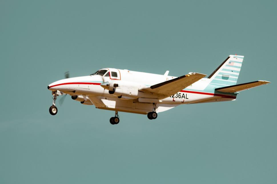 Free Stock Photo of Small Airplane Flying Through Blue Sky | Download ...