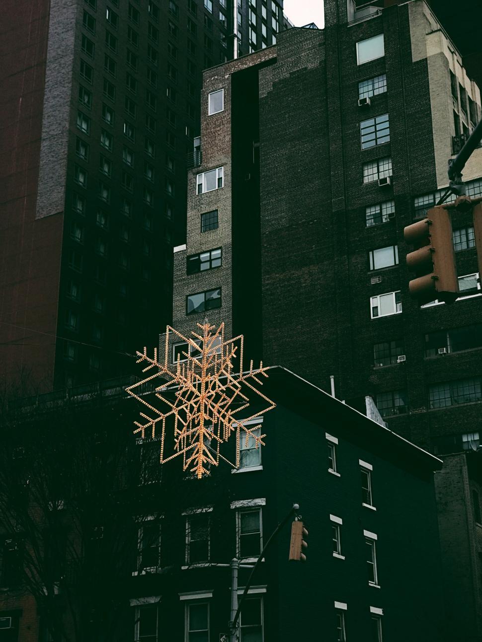 Free Stock Photo of Snowflake on Building in Urban Setting | Download ...