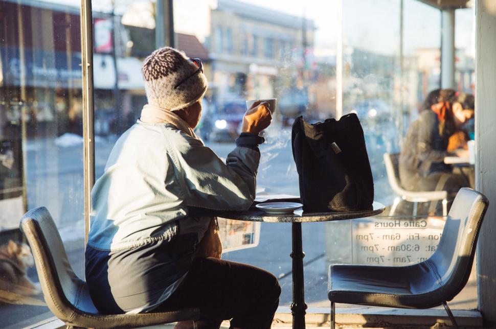 Free Stock Photo of Man Sitting at Table in Front of Window | Download ...