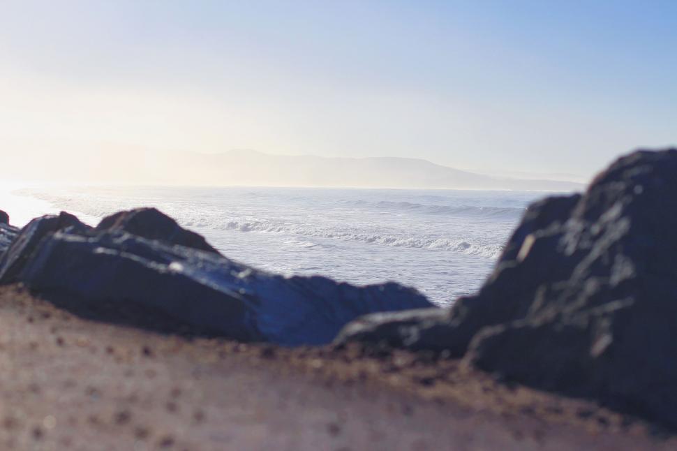 Free Stock Photo of Blurry Beach With Rocks and Water | Download Free ...
