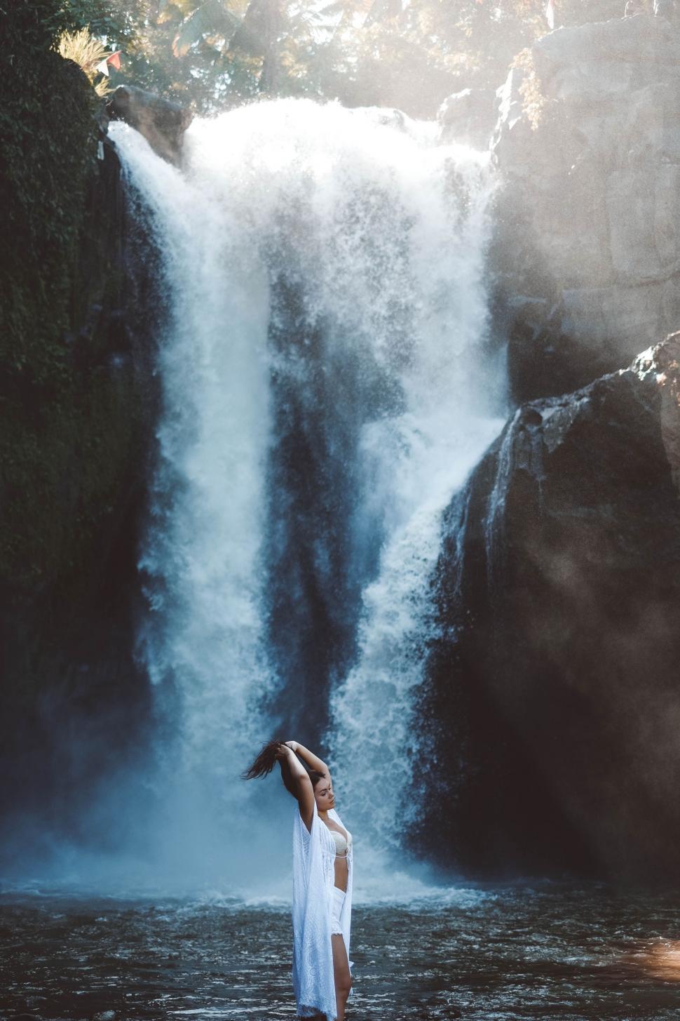 Free Stock Photo of Woman Standing in Front of Waterfall | Download ...