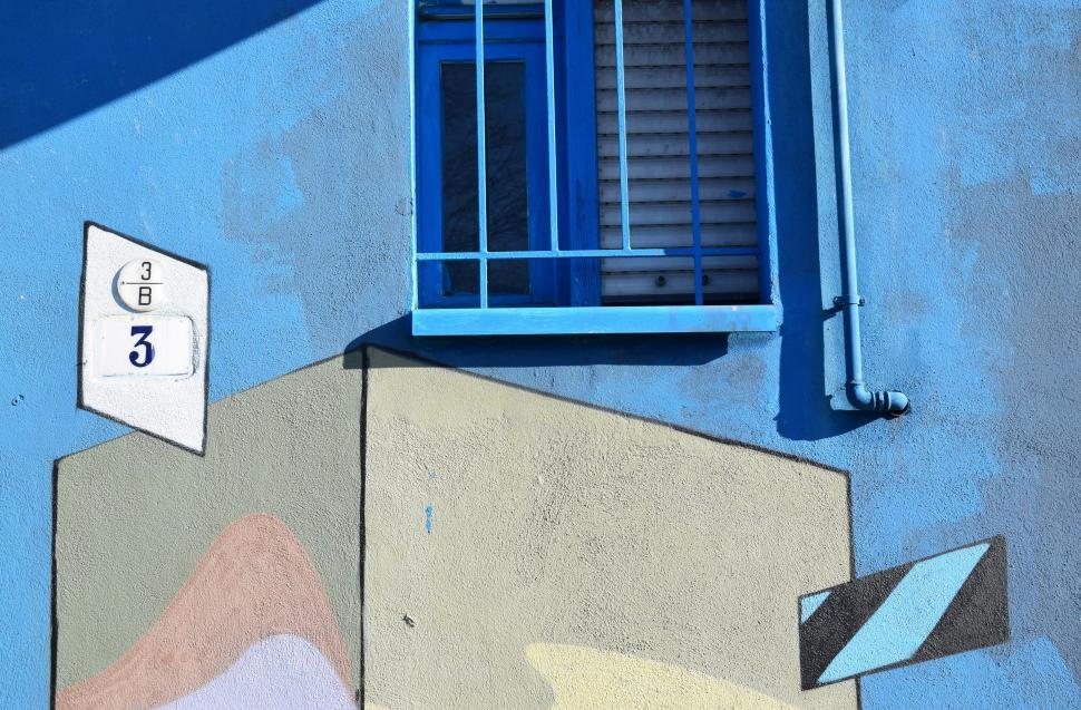 Free Stock Photo of Blue Building With Blue Window and White Sign ...