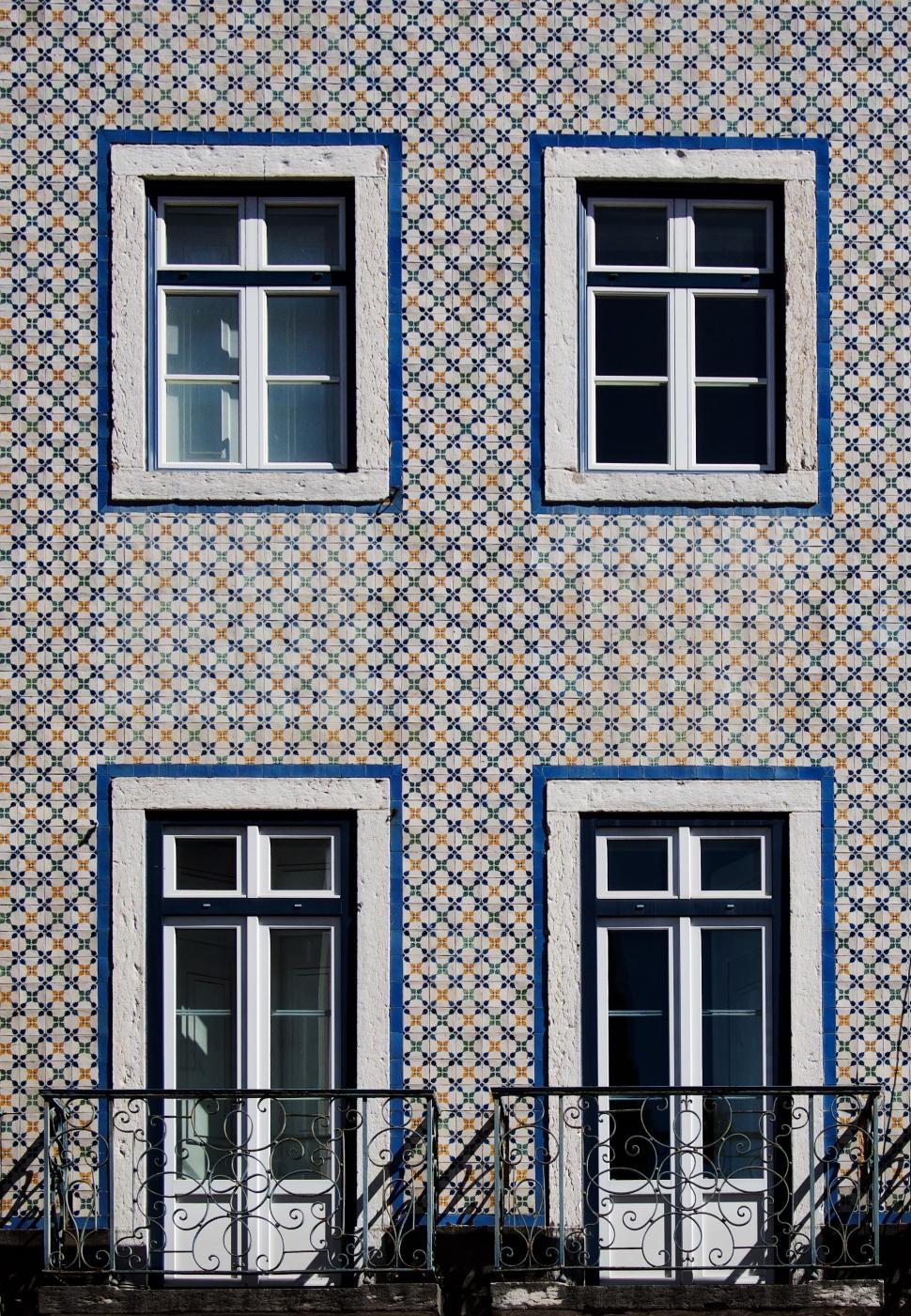 Free Stock Photo of Blue and White Building With Windows and Balconies ...