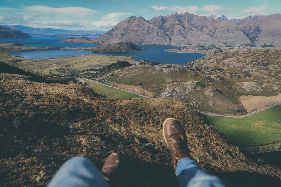 Free Stock Photo of Person Standing on Mountain Overlooking Lake ...