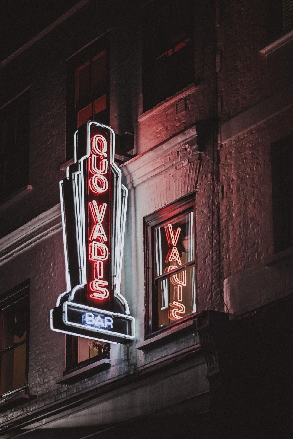 Free Stock Photo of Neon Sign Illuminating Building Facade | Download ...