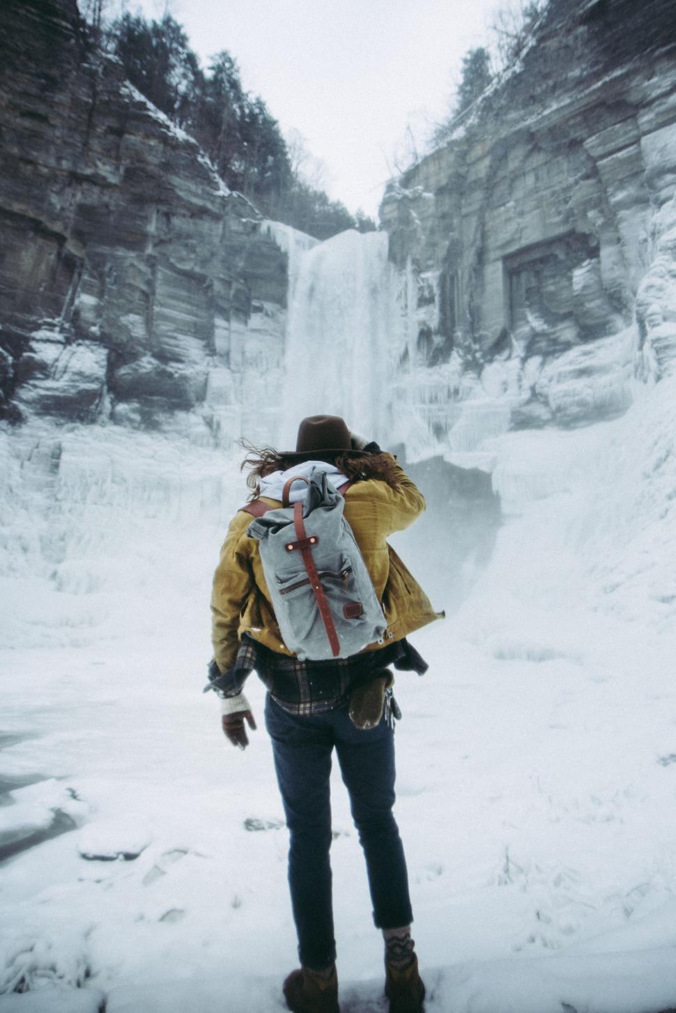 Free Stock Photo of Person With Backpack Standing in Front of Waterfall ...