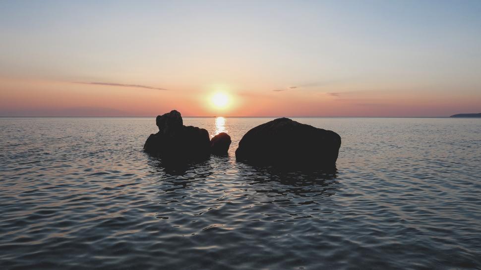 Free Stock Photo of Rocks Floating in Middle of Body of Water ...