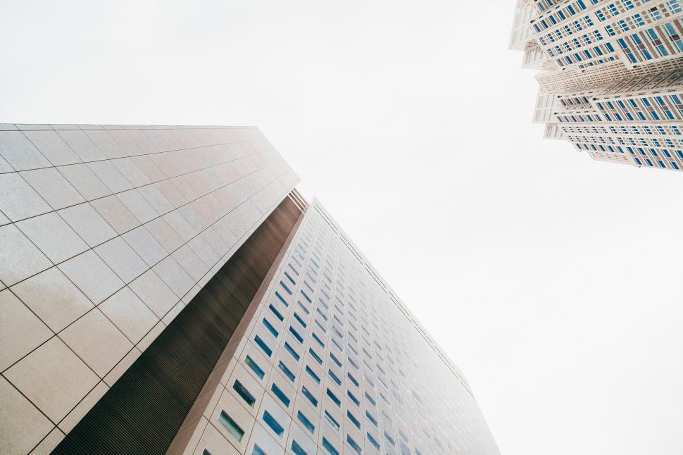 Free Stock Photo of Two Tall Buildings Standing Side by Side in ...