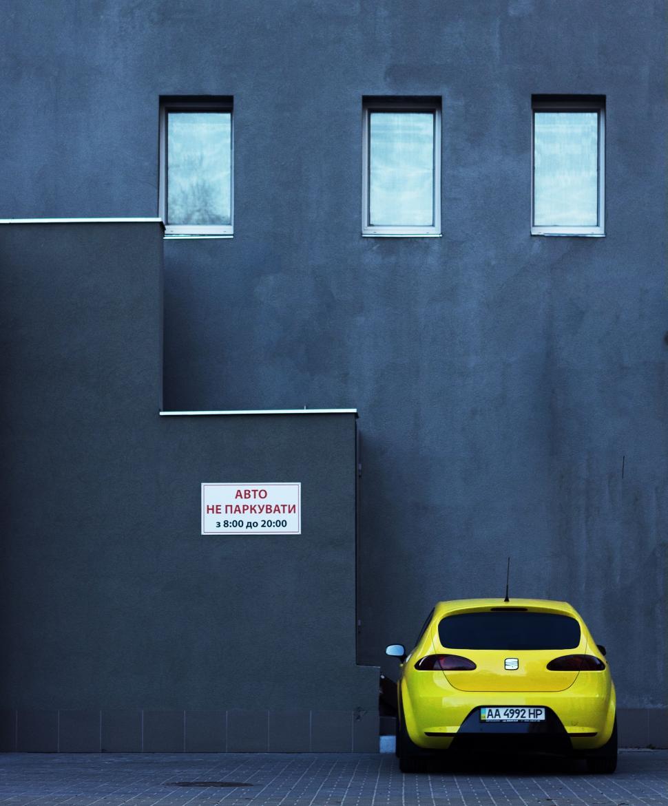 Free Stock Photo of Yellow Car Parked in Front of Building | Download ...