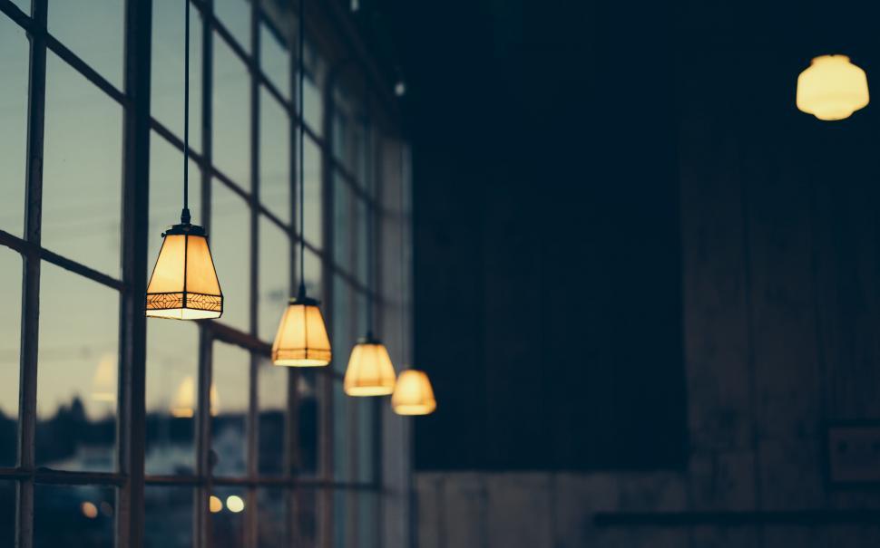 Free Stock Photo of Row of Lights Hanging From Side of Building ...
