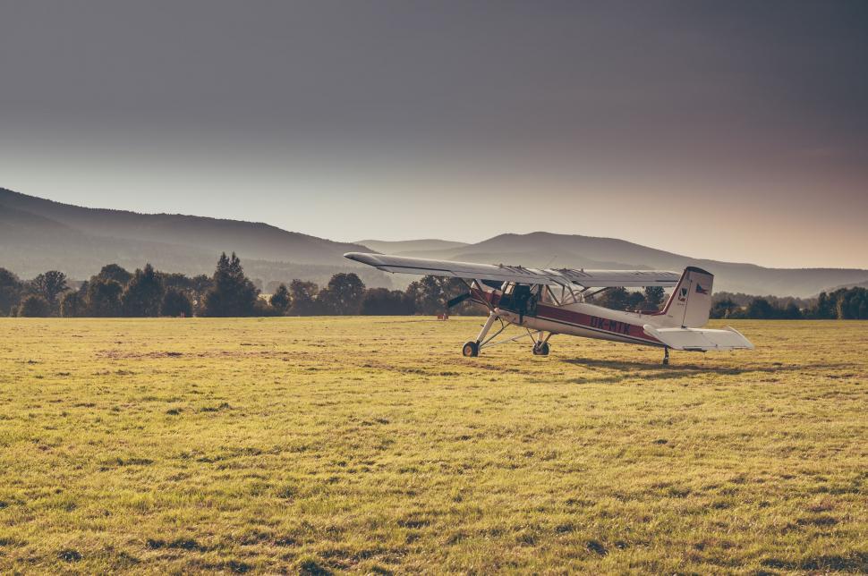 Free Stock Photo of Small Plane Parked on Grass Field | Download Free ...