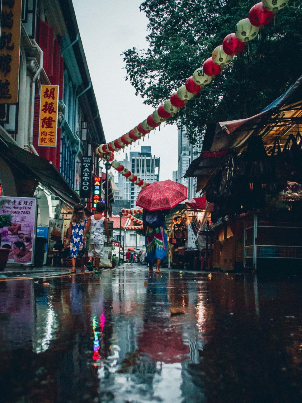 Free Stock Photo of People Walking Down City Street on Rainy Day ...