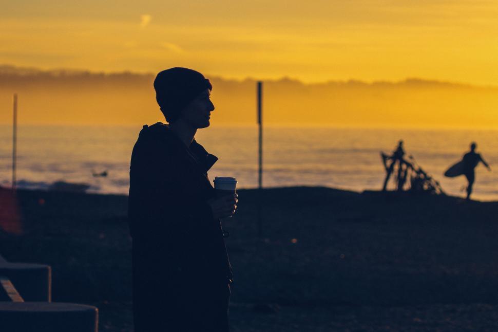 Free Stock Photo of Person Standing on Beach at Sunset | Download Free ...