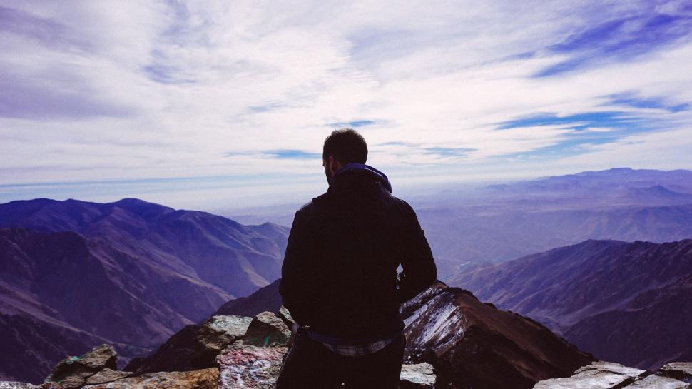 Free Stock Photo of Man Standing on Mountain Overlooking Valley ...