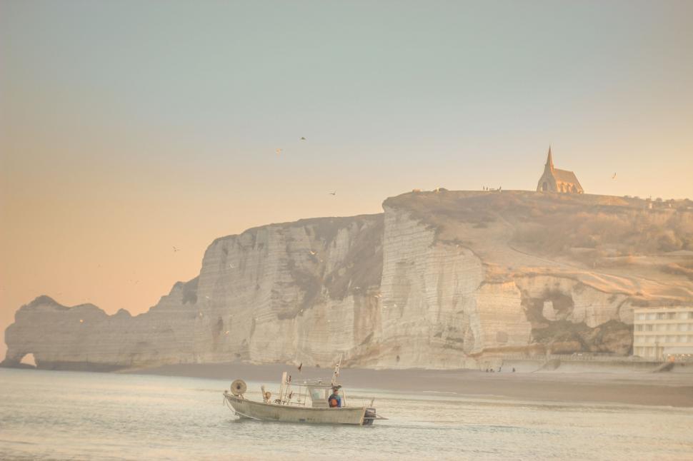 Free Stock Photo of Boat Sailing Near Cliff on Water | Download Free ...