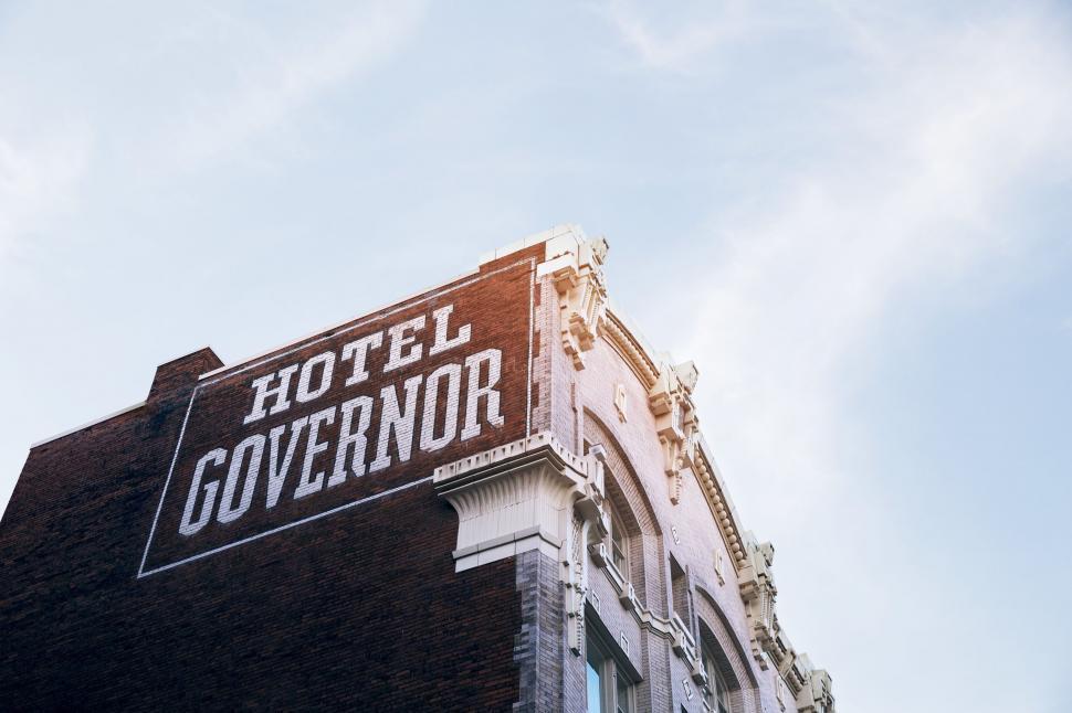 Free Stock Photo of Hotel Sign Displayed on Side of Building | Download ...