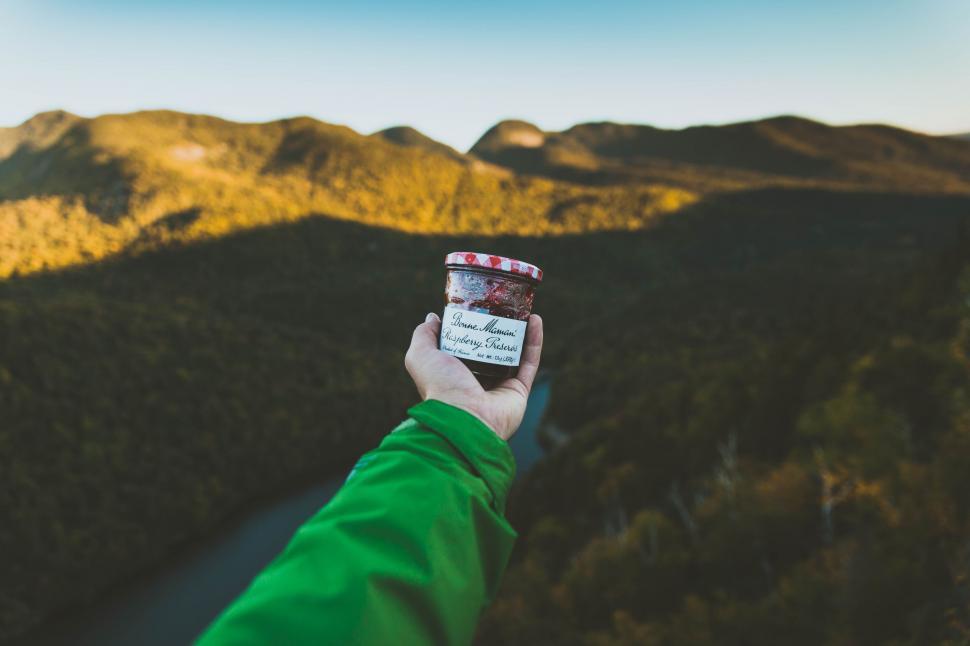 Free Stock Photo of Person Holding a Cup of Coffee Up in the Air ...
