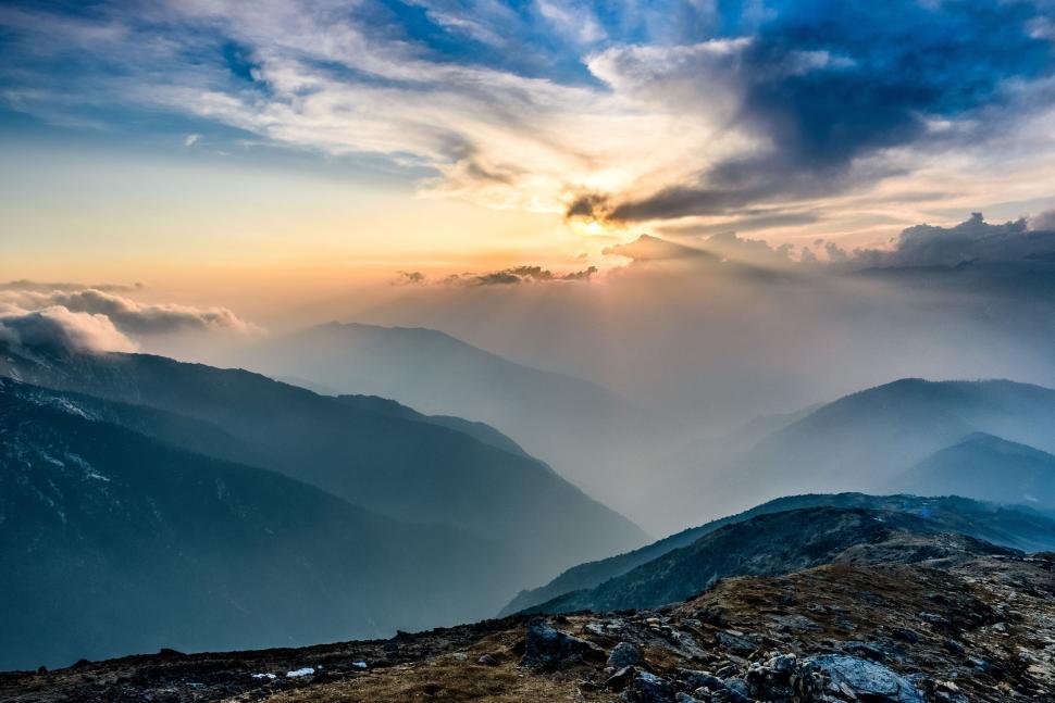 Free Stock Photo of Sun Shining Through Clouds Over Mountains ...