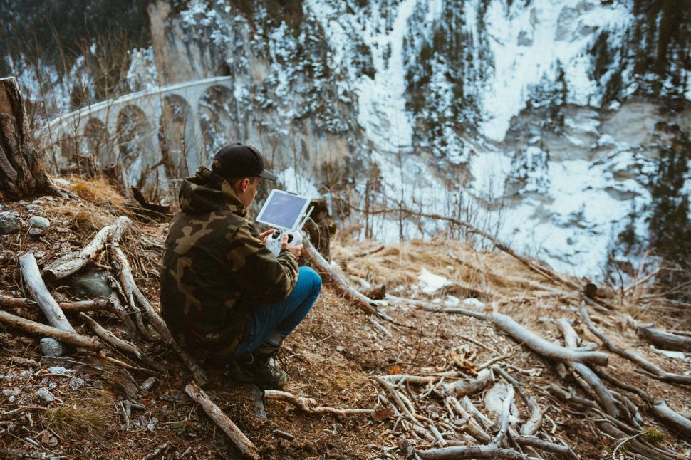 Free Stock Photo of Man Sitting on Hill Using Laptop Computer ...
