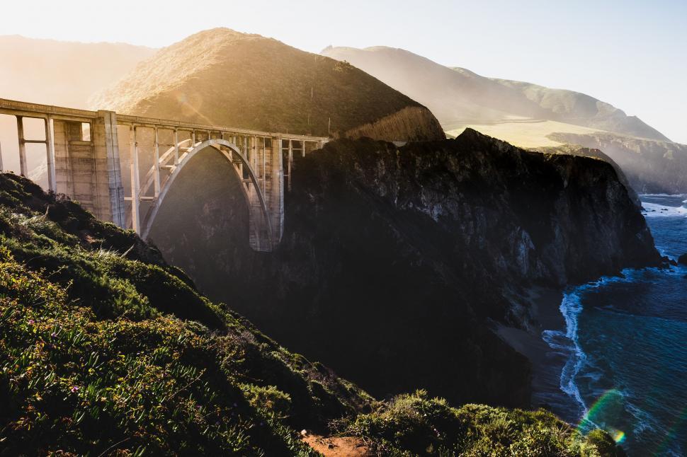 Free Stock Photo of Bridge Crossing Over Water With Mountain Background ...