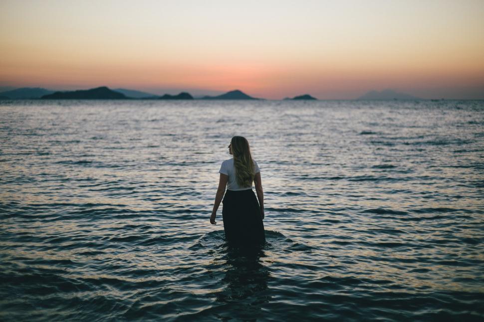 Free Stock Photo of Woman Standing in Ocean at Sunset | Download Free ...