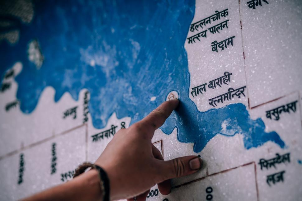 Free Stock Photo of Hand Pointing at Map on Wall | Download Free Images ...