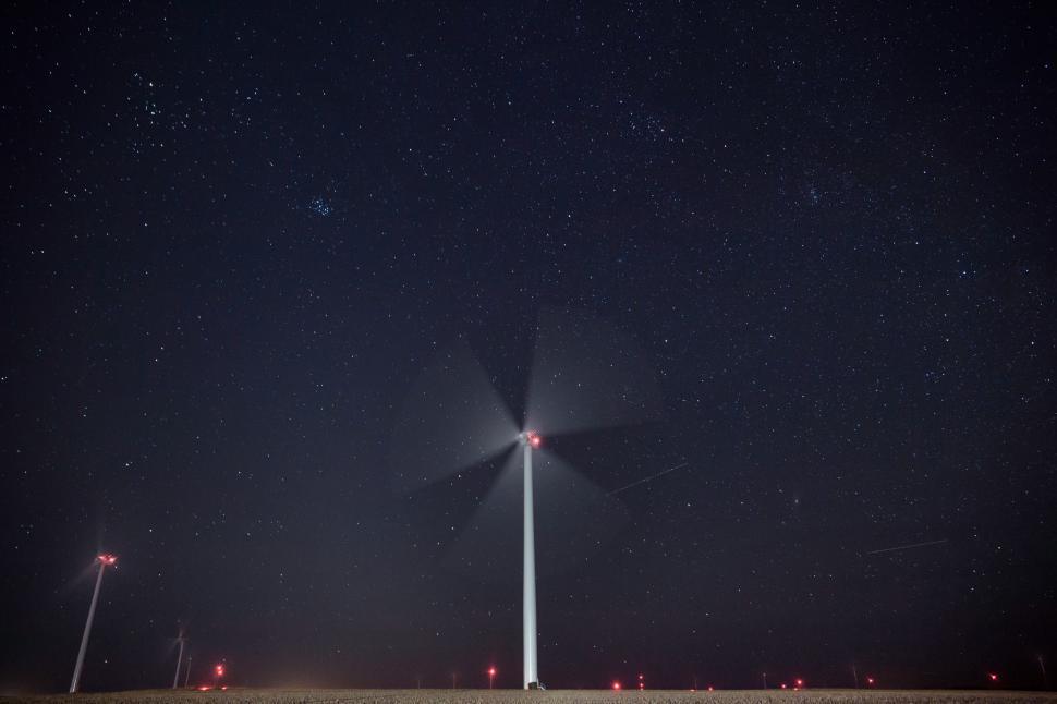 Free Stock Photo of Wind Turbine Illuminating Field at Night | Download ...