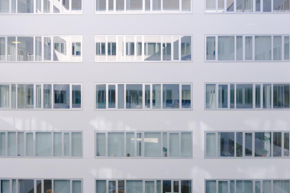 Free Stock Photo of Tall White Building With Lots of Windows | Download ...
