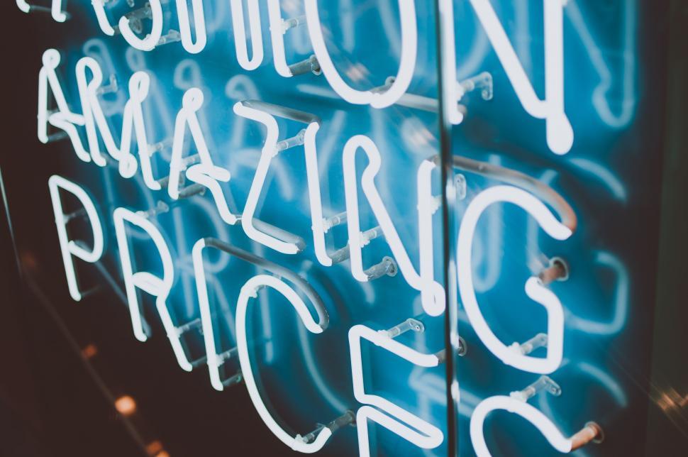 Free Stock Photo of Neon Sign Mounted on the Side of a Building ...