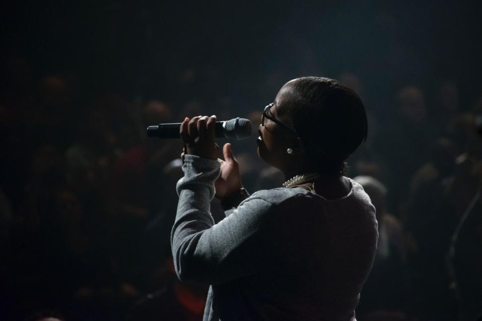 Free Stock Photo of Man Holding Microphone in Front of Crowd | Download ...