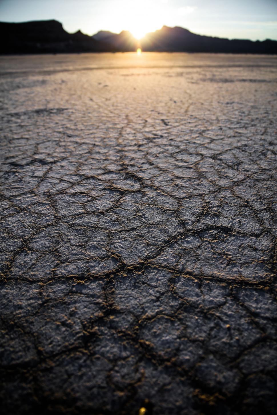 Free Stock Photo of Sun Setting Over Barren Landscape | Download Free ...
