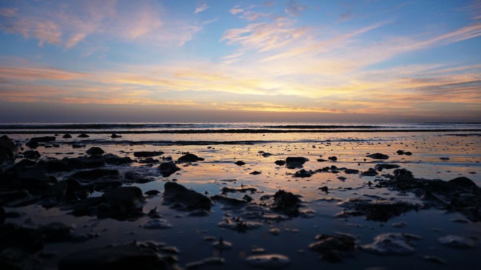 Free Stock Photo of Sun Setting Over Water at Beach | Download Free ...