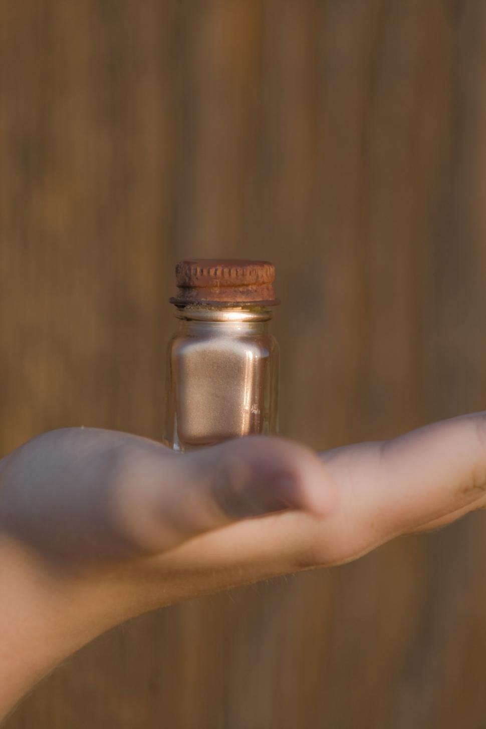 Free Stock Photo of Person Holding Small Jar in Hand | Download Free ...