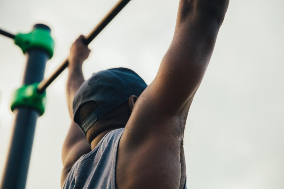 Free Stock Photo of A young african man doing chin-up exercise ...