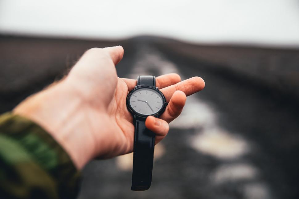 Free Stock Photo of Wrist watch held in hand over road | Download Free ...
