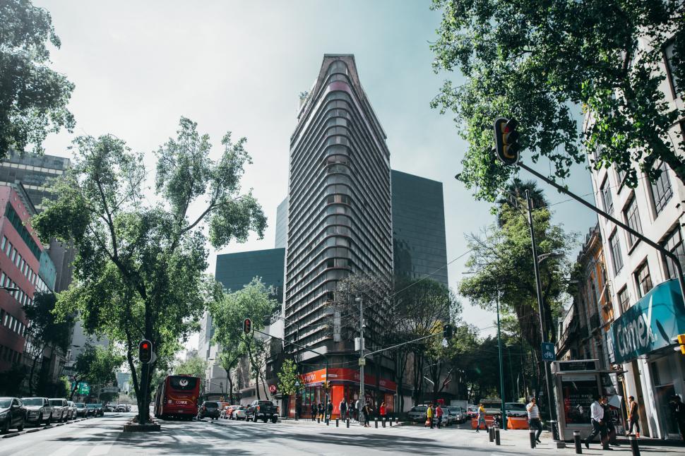 Free Stock Photo of Corner view of a glass building in a tropical city ...