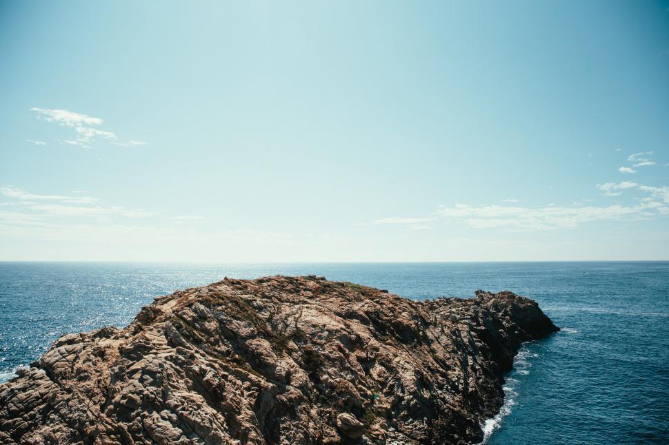 Free Stock Photo of A rocky cliff in the ocean | Download Free Images ...
