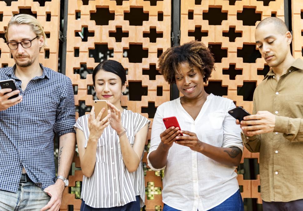 Free Stock Photo of Various people looking at their mobile phones ...