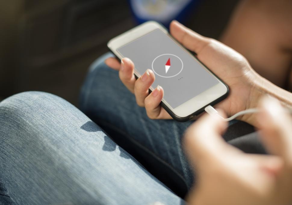 Free Stock Photo of Close up a mobile phone in a hand being charged and ...
