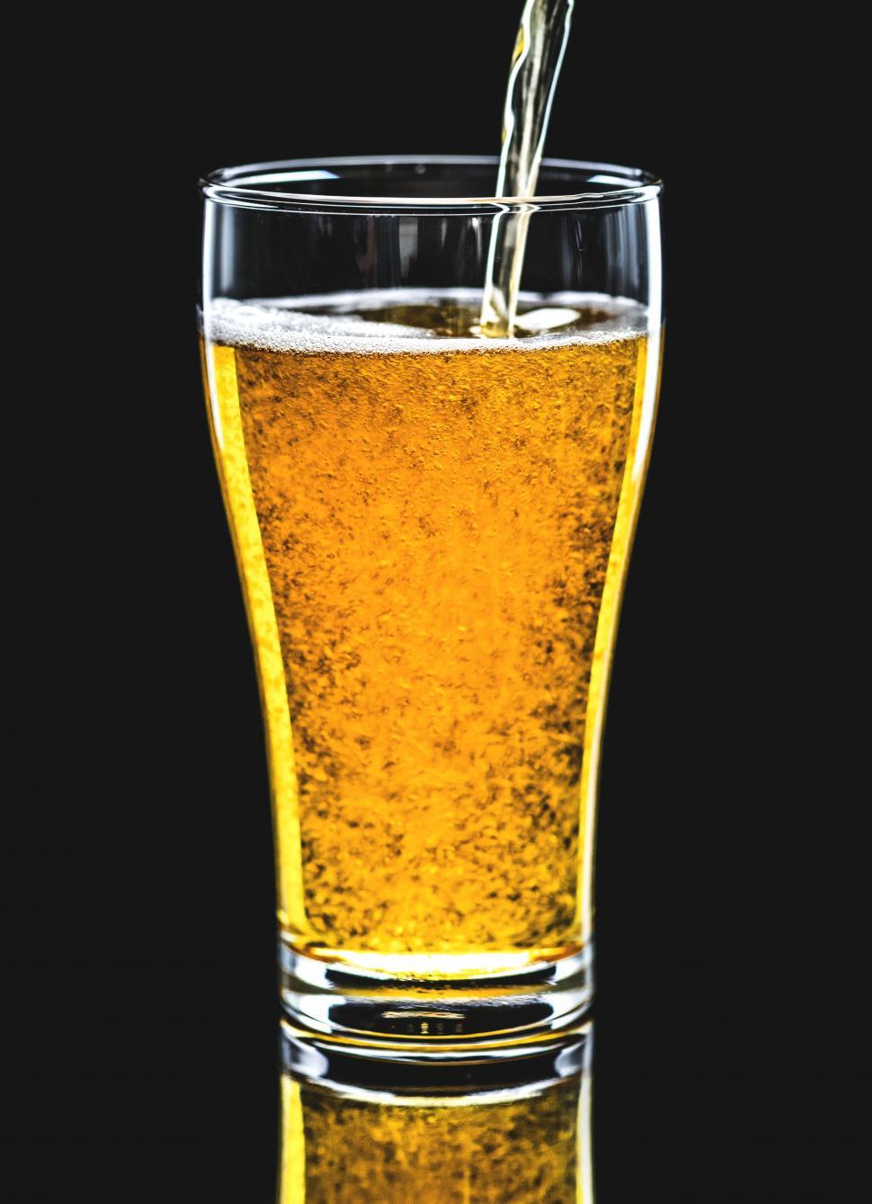 Free Stock Photo of Amber beer being poured into a pint glass ...