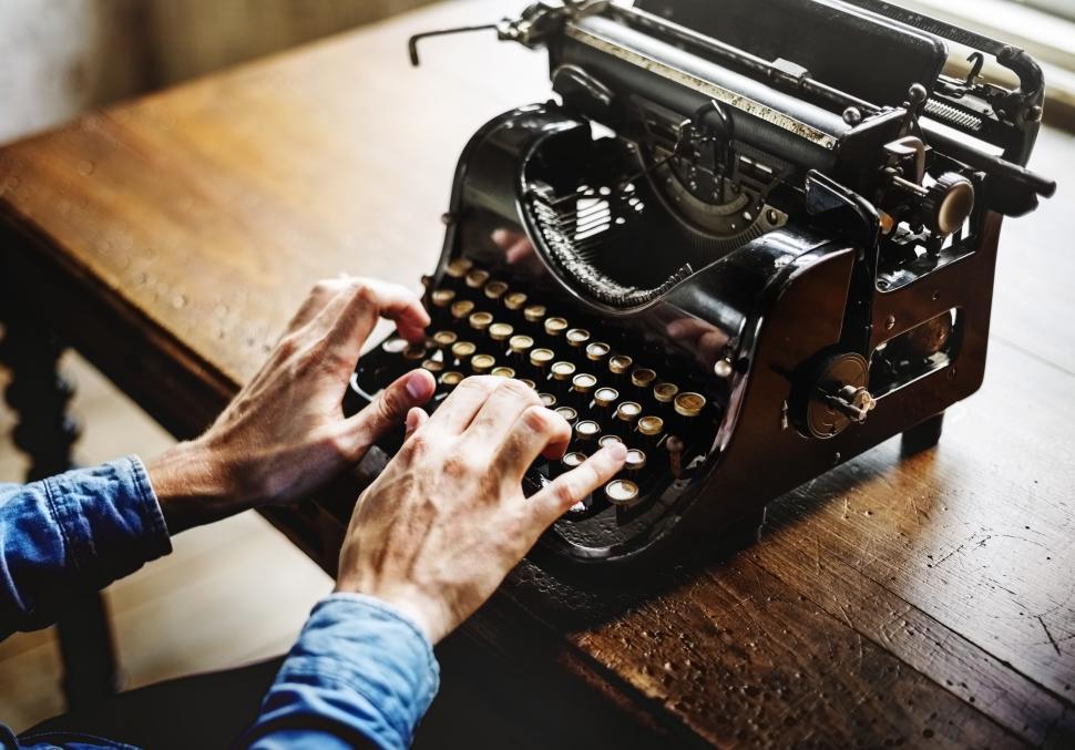 Free Stock Photo of Close up of hands typing on a vintage mechanical ...
