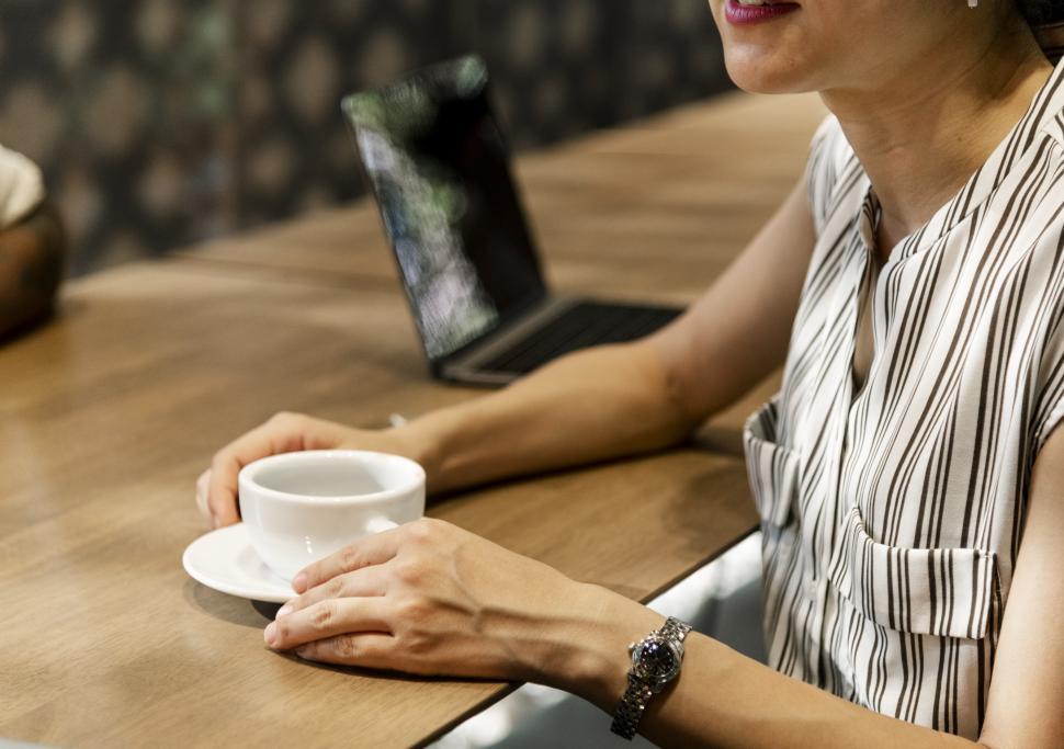 Free Stock Photo of An anonymous woman enjoying coffee at a cafe ...