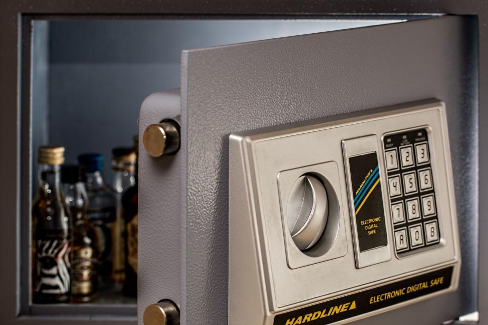 Free Stock Photo of Close Up of Safe With Bottles in Background ...
