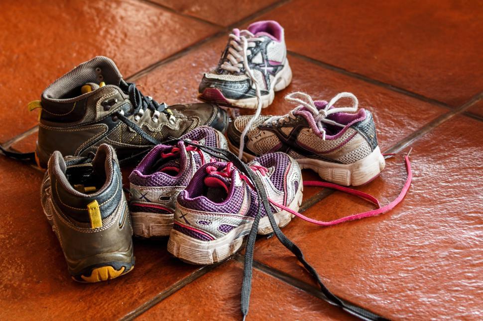 Free Stock Photo of Group of Shoes Resting on Tiled Floor | Download ...