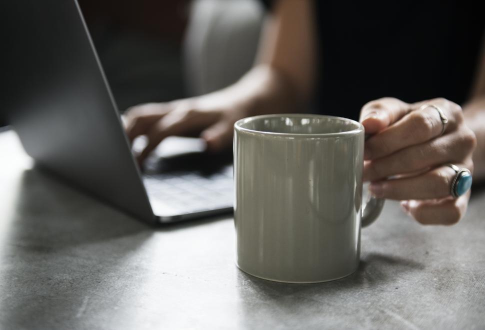 Free Stock Photo of Close up of a womans hand holding a coffee mug ...