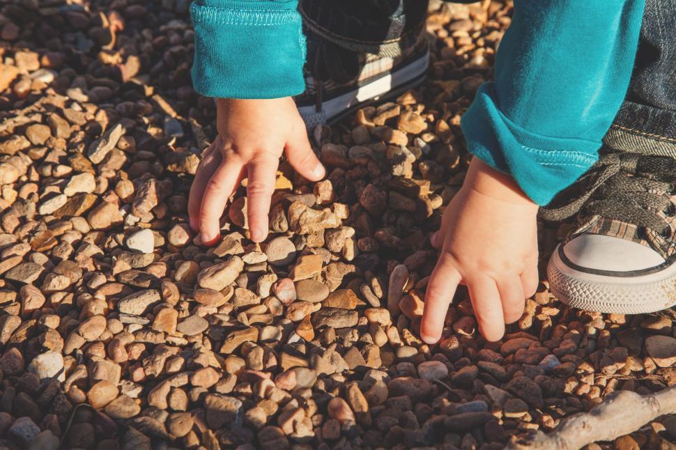 Free Stock Photo of Child Playing with Pebble Stones | Download Free ...