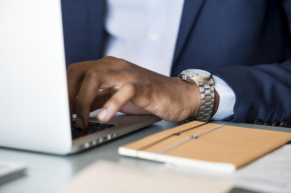 Free Stock Photo of Close up of a business person typing on the laptop ...