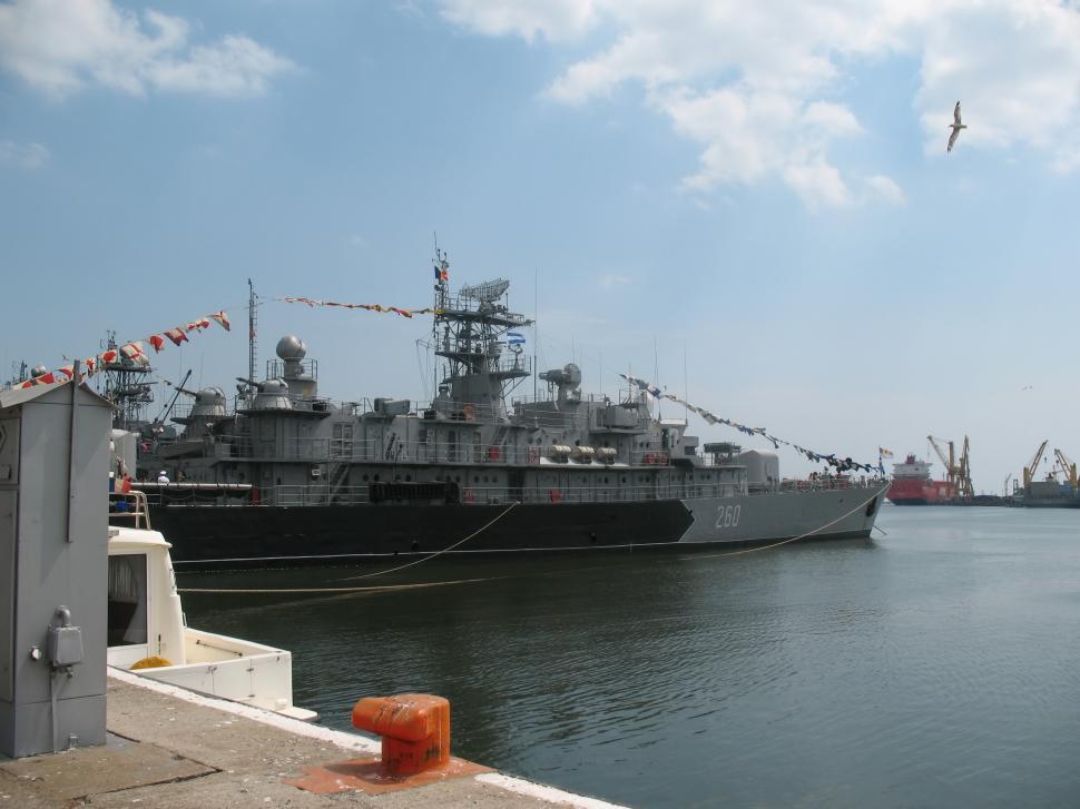 Free Stock Photo of A war ship at the dock open ocean in the background ...