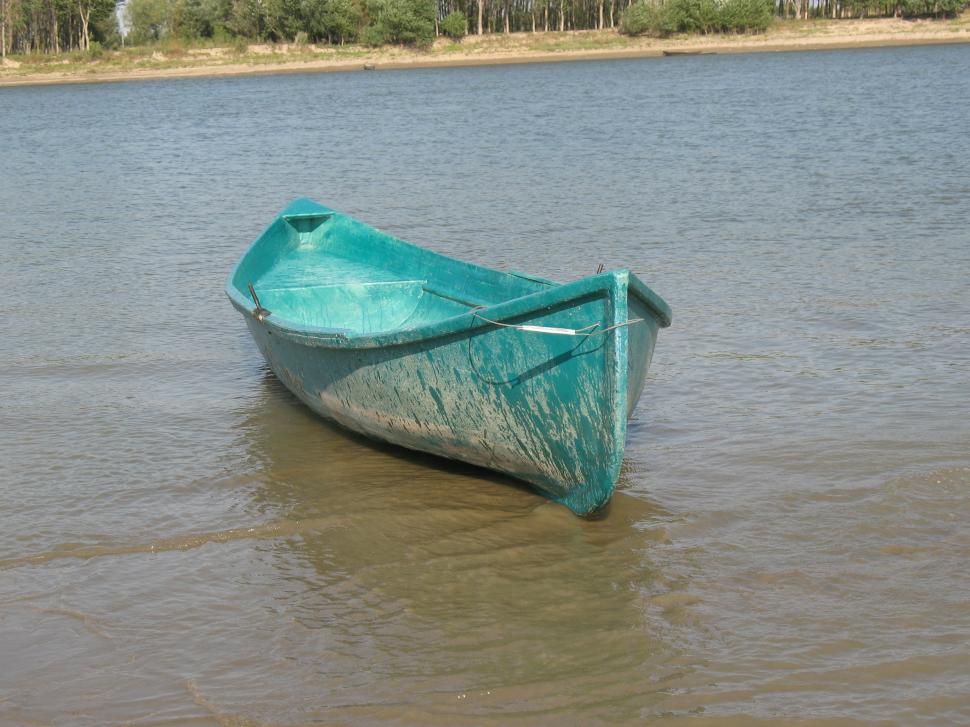 Free Stock Photo of Small empty blue boat in the middle of a river ...